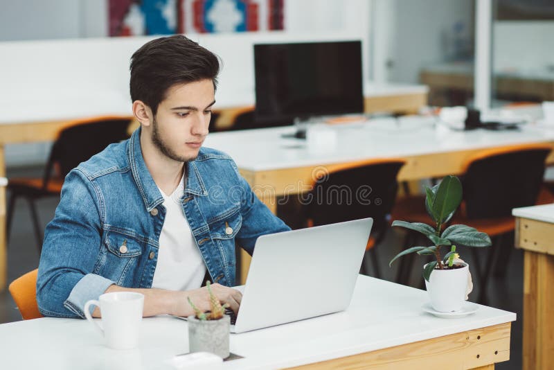 Serious Young Guy with Beard Working on Laptop Stock Image - Image of ...