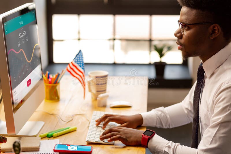 Serious Young Man Checking the Financial Statistics Stock Image - Image ...