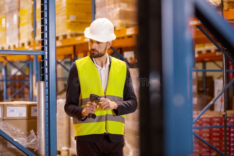 Serious Young Man Checking the Inventory Stock Photo - Image of ...