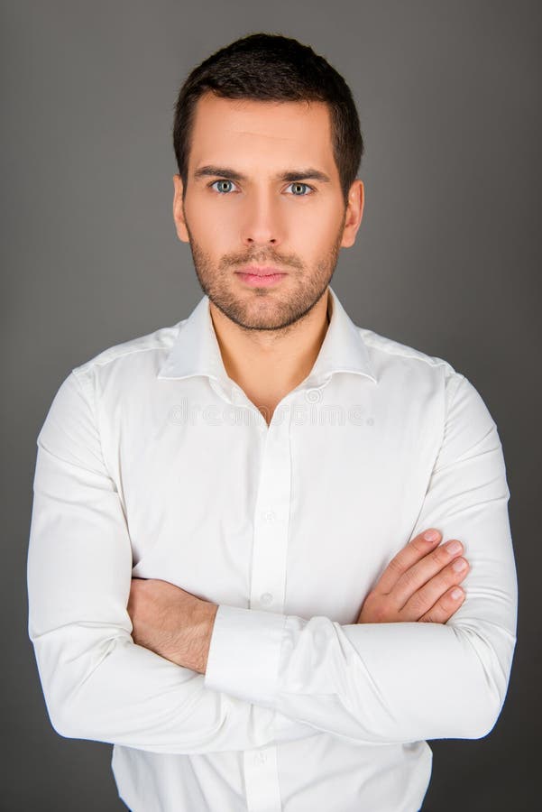 Serious Young Man with Cross Hands Stock Image - Image of gesture ...