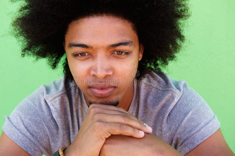 Serious Young Man Thinking and Looking Down Stock Photo - Image of ...