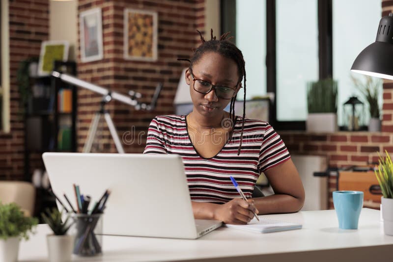Serious Young Remote Student Watching Educational Tutorial, Taking ...
