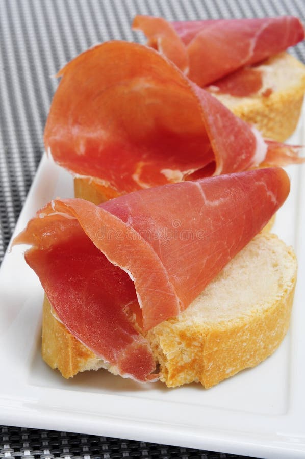 Spanish ham and tomato stock photo. Image of snack, savory - 16245620
