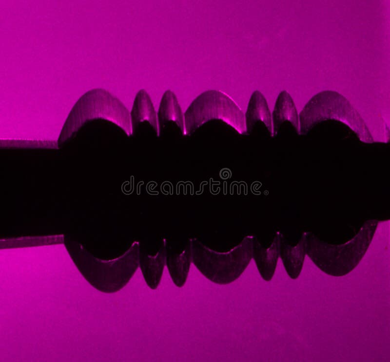 Serrations of a Knife Reflected in a Shiny Black Surface Stock Photo ...