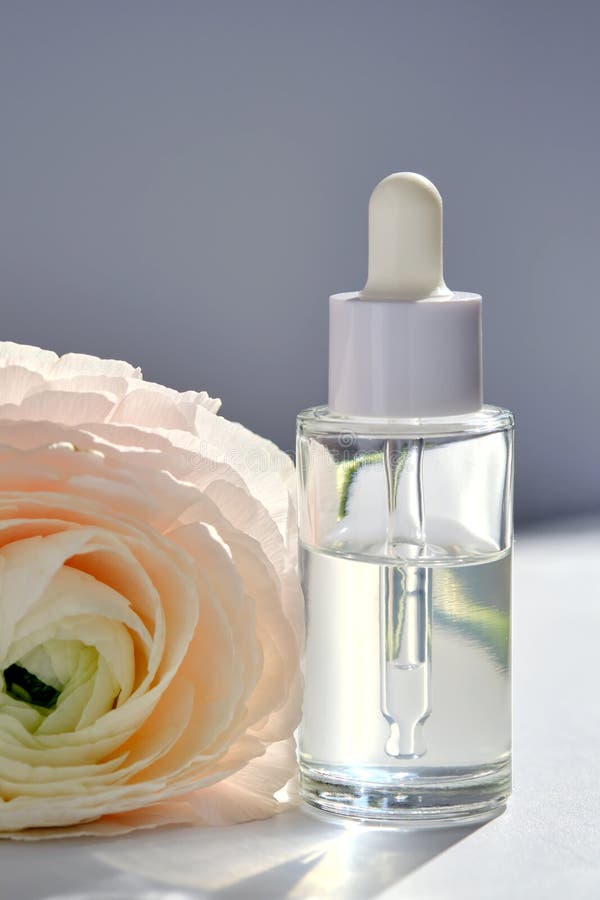 Serum with a Dropper with Spring Flowers. Stock Photo - Image of ...