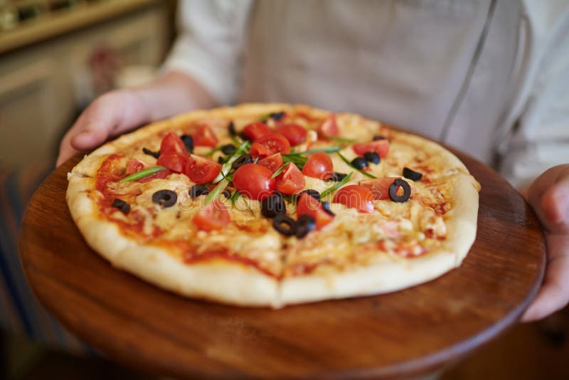 Serve pizza stock image. Image of tomato, lunch, kitchen - 76285887