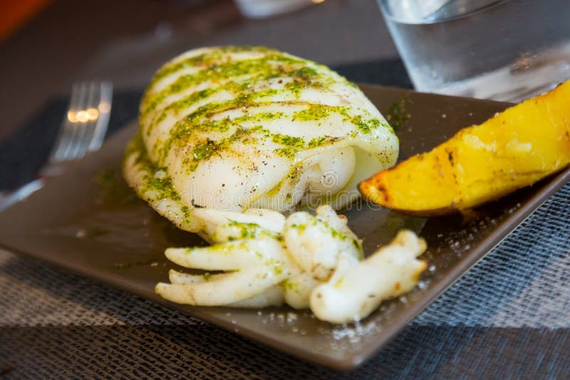 Served baked ink-fish stock photo. Image of braised, eating - 89018288