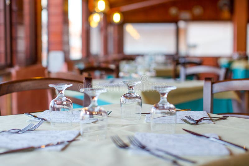 Served Table Set at Restaraunt in the Evening Stock Image - Image of ...