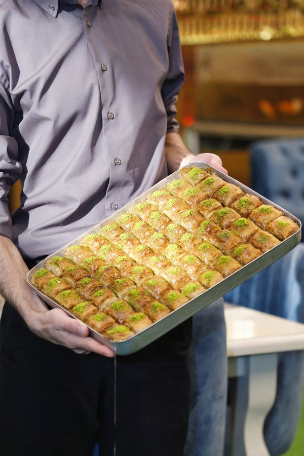 Server Carrying Tray of Baklava in Restaurant Stock Photo - Image of ...
