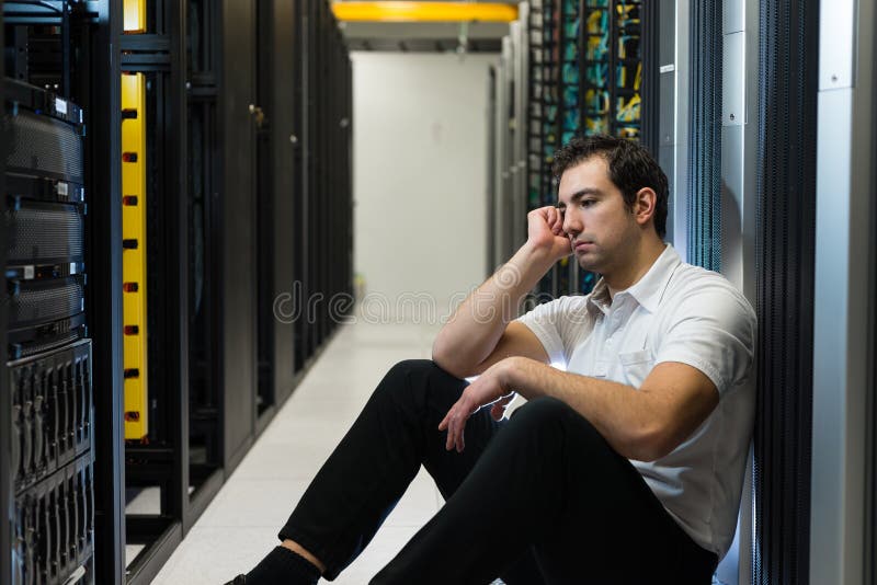 Businessman with Laptop in Network Server Room Stock Photo - Image of ...