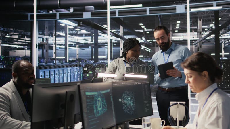 Server Hub Supervisor Overseeing Computer Scientists Improving Neural Network Stock Footage ...