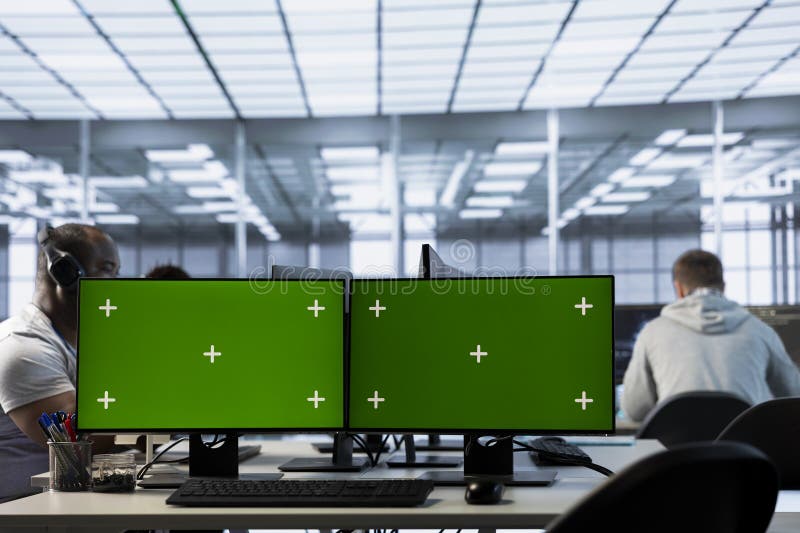 Server Hub Workers Configuring and Testing Equipment with Chroma Key ...