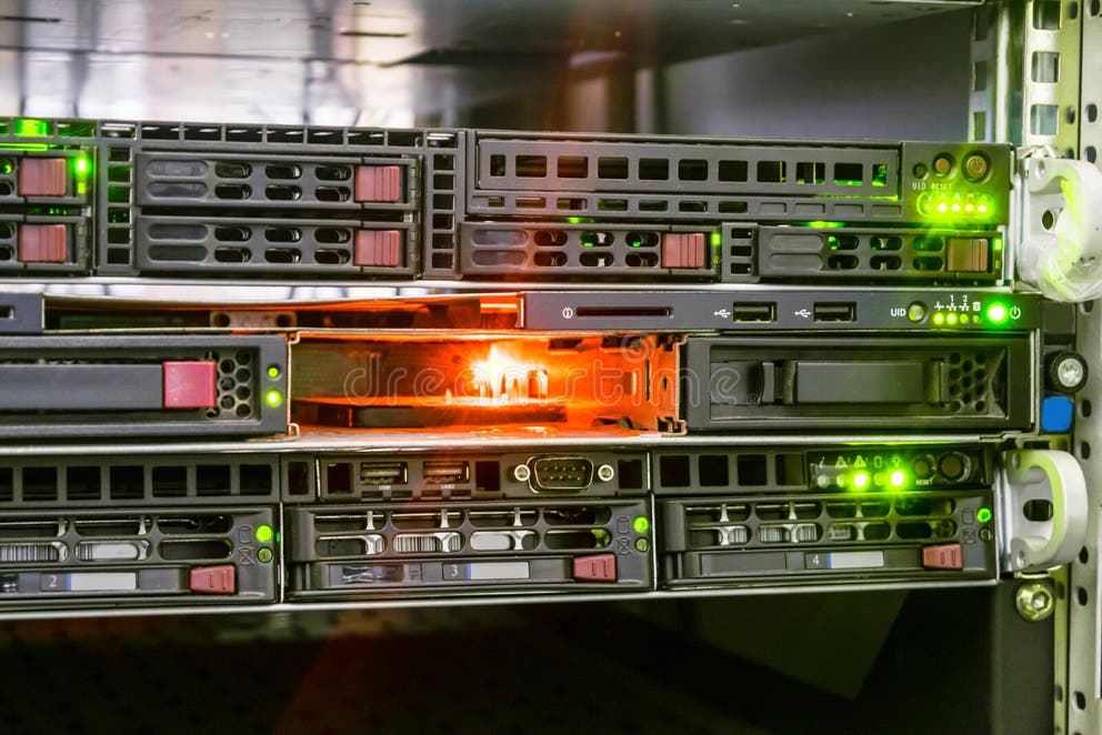 A Server with Multiple Hard Drives Works in a Data Center Rack. a Place ...