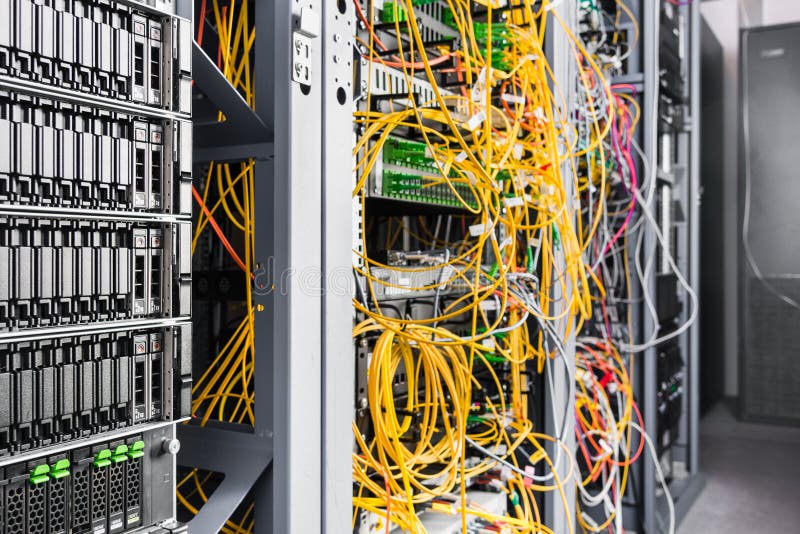 Server Rack with Fiber Optic Cables Attached To Front Panel Swit Stock ...