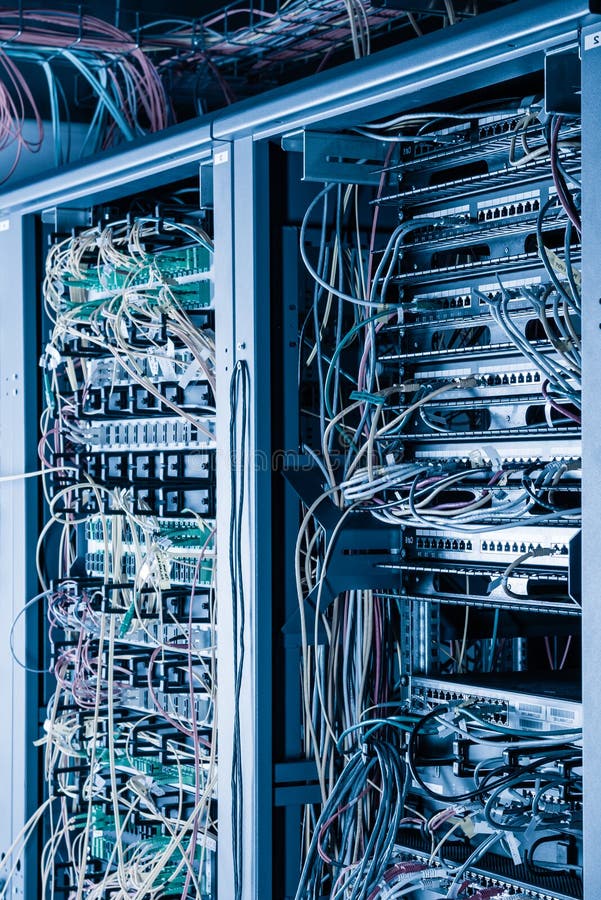 Server Rack with Fiber Optic Cables Attached To Front Panel Swit Stock ...
