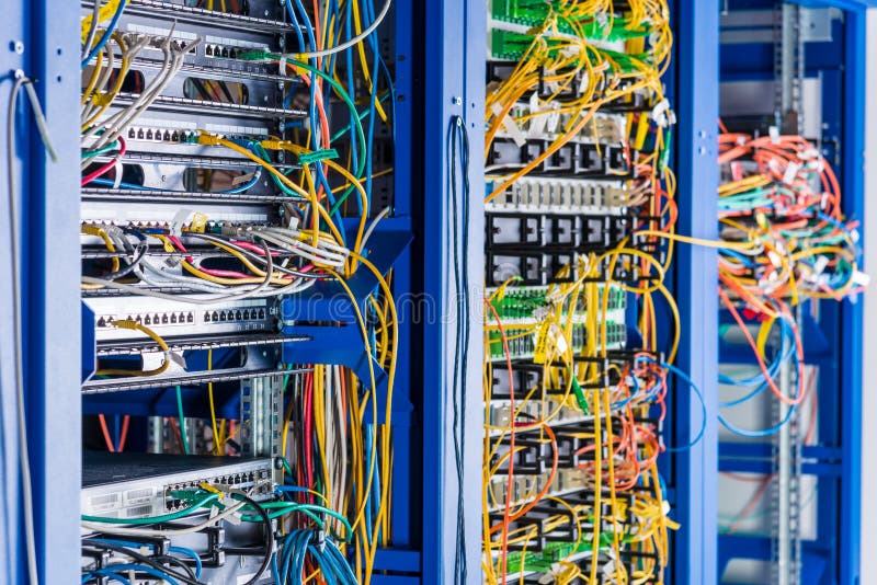 Server Rack with Fiber Optic Cables Attached To Front Panel Swit Stock ...