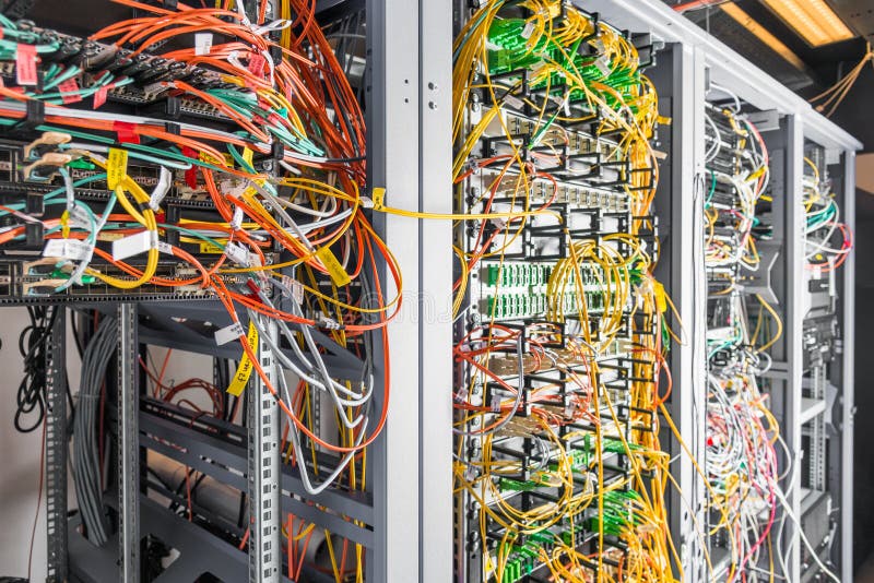 Server Rack with Fiber Optic Cables Attached To Front Panel Swit Stock ...