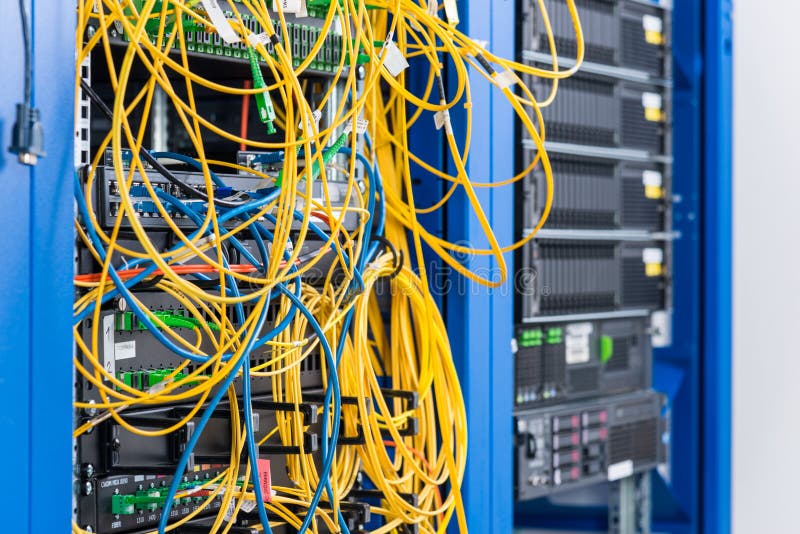 Server Rack with Fiber Optic Cables Attached To Front Panel Swit Stock ...