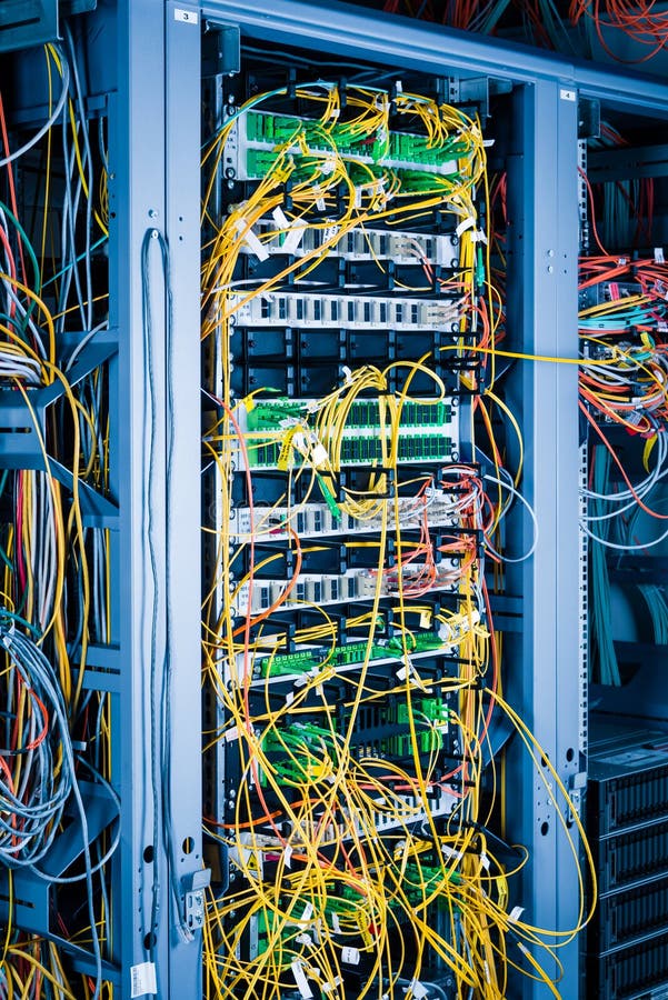 Server Rack with Fiber Optic Cables Attached To Front Panel Swit Stock ...