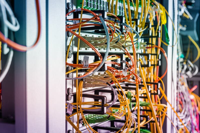 Server Rack with Fiber Optic Cables Attached To Front Panel Swit Stock ...