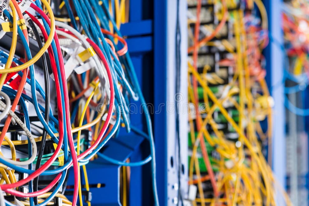 Server Rack with Fiber Optic Cables Attached To Front Panel Swit Stock ...