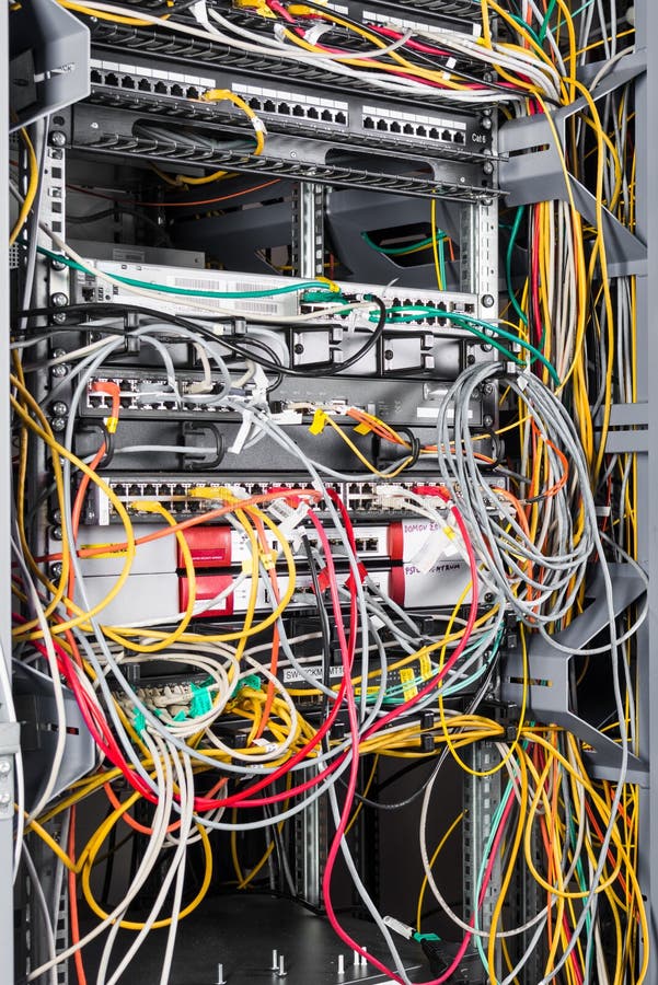 Server Rack with Fiber Optic Cables Attached To Front Panel Swit Stock ...