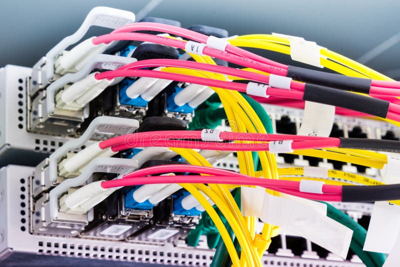 Server Rack with Fiber Optic Cables Attached To Front Panel Swit Stock ...