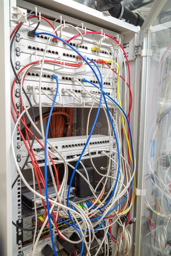 In a Server Rack Many Different Colored Network Cables are Connected To ...