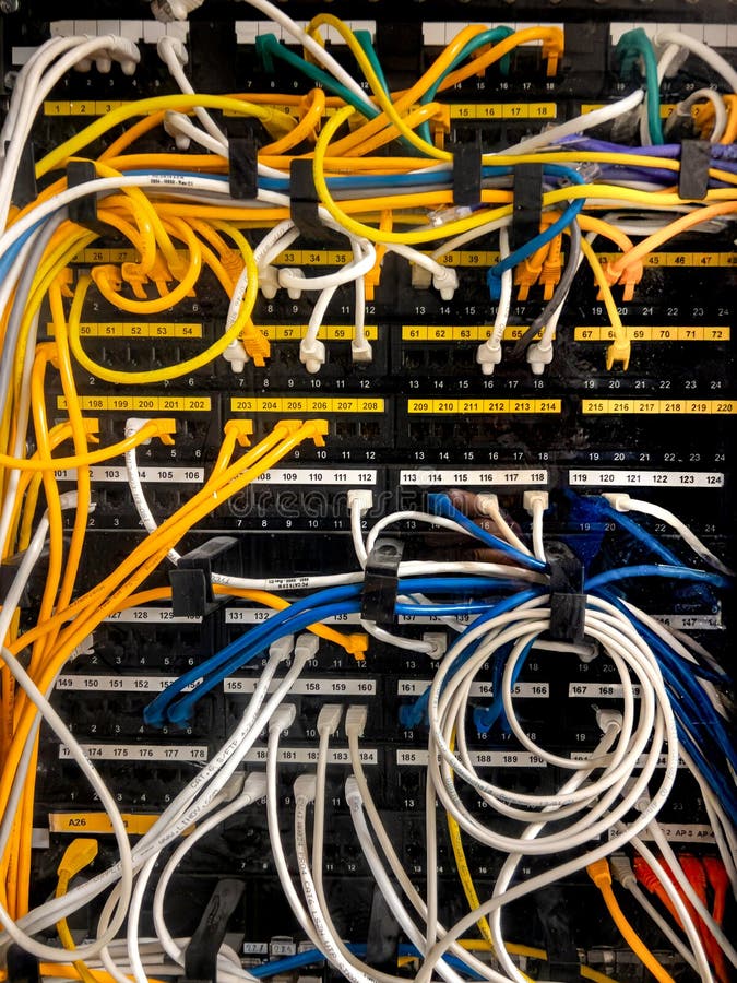Server Racks with Blue Yellow and White Internet Patch Cords Stock ...