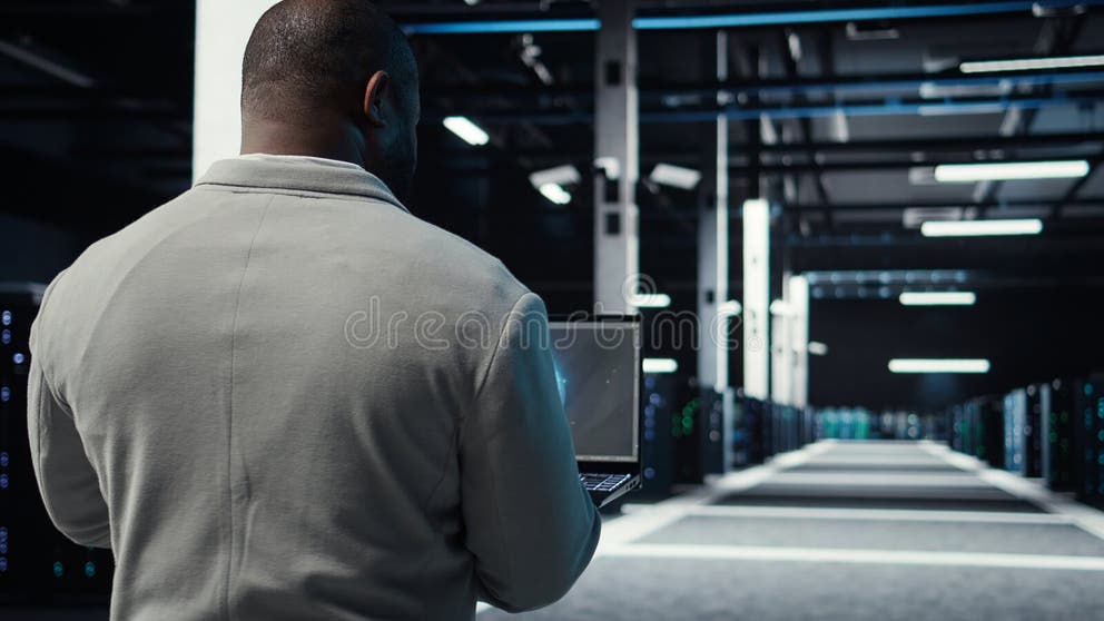 Server Room Admin Using Laptop To Do Infrastructure AI Automatization ...