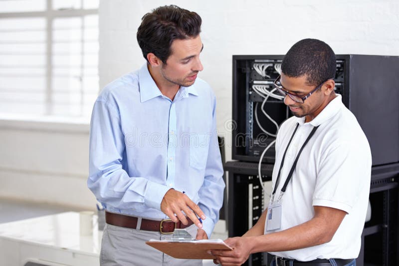 Server Room, Clipboard and Discussion with a Technician Talking To a ...
