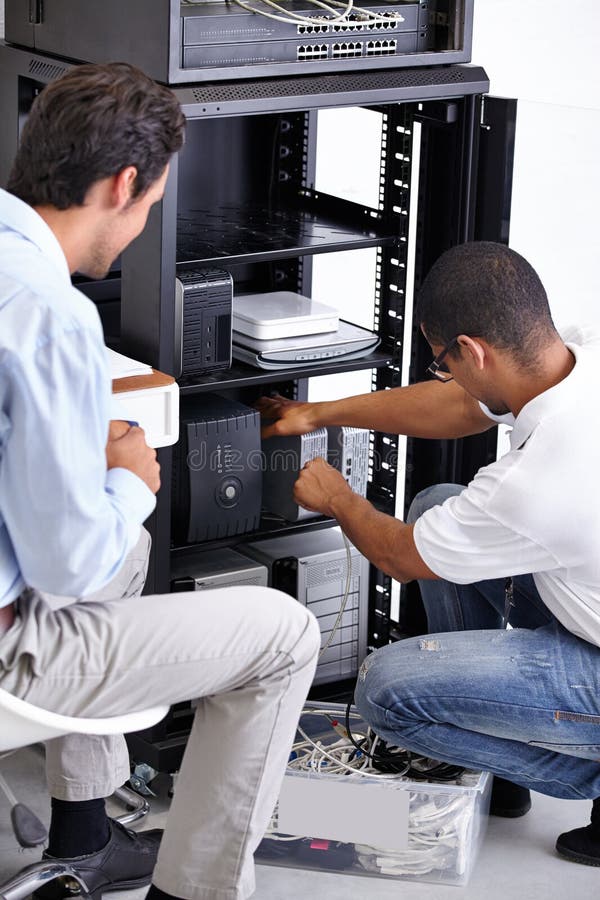 Server Room, Man or Electrician Fixing Electronics for Hardware ...