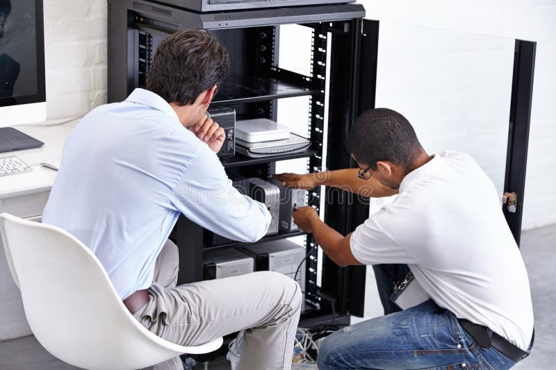 Server Room, Man and Technician Working with Electronics for Hardware ...