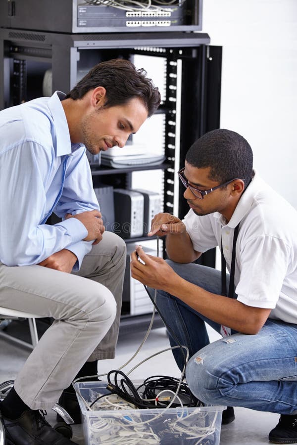 Server Room, Network and Maintenance with a Technician Talking To a ...