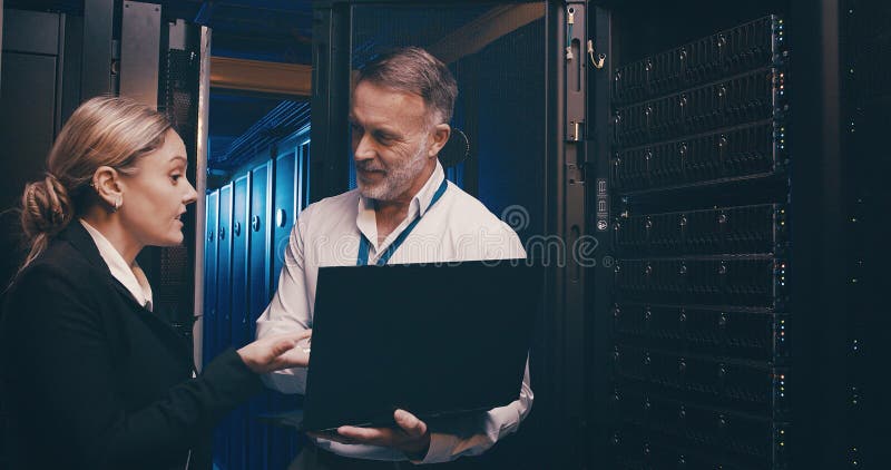 Server Room, Online and People on Laptop for Network Maintenance, it Support and Database ...