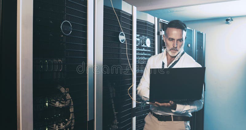 Server Room, Information Technology and Man with Laptop, Check Connectivity and Night Job ...