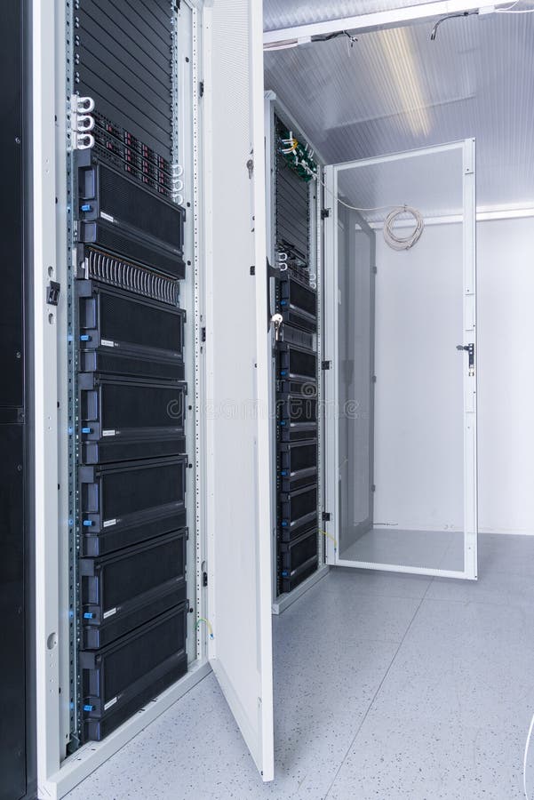 Server Room with a Row of Server Racks Stock Photo - Image of digital ...