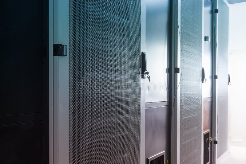 Server Room with a Row of Server Racks Stock Photo - Image of ...