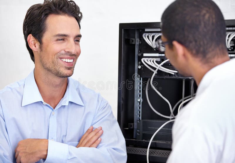 Server Room, it Support and Network with an Engineer Talking To a ... Server Room, it Support and Network with an Engineer Talking To a ...