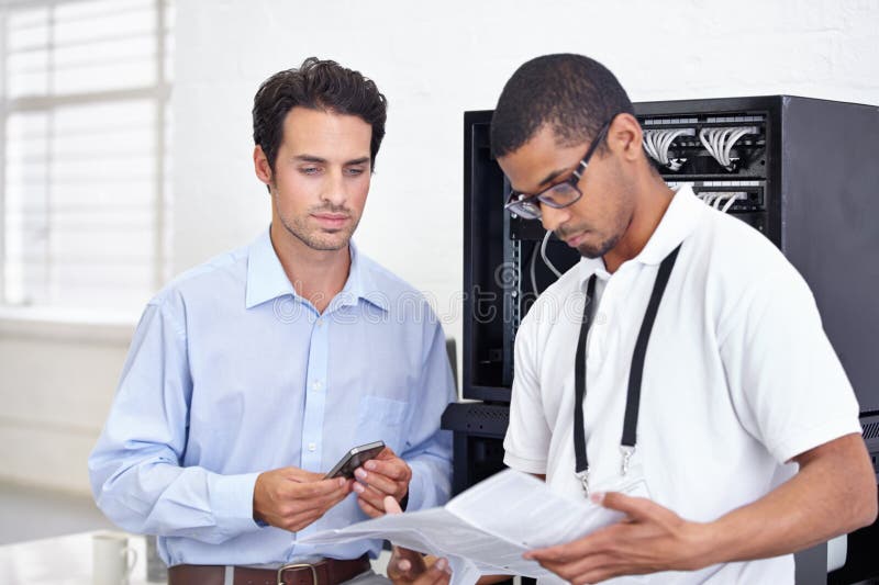 Server Room, it Support and Reading with an Engineer Working with a ... Server Room, it Support and Reading with an Engineer Working with a ...