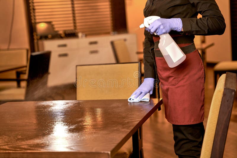 Server in Working Uniform Cleaning Table with Detergent Stock Photo ...