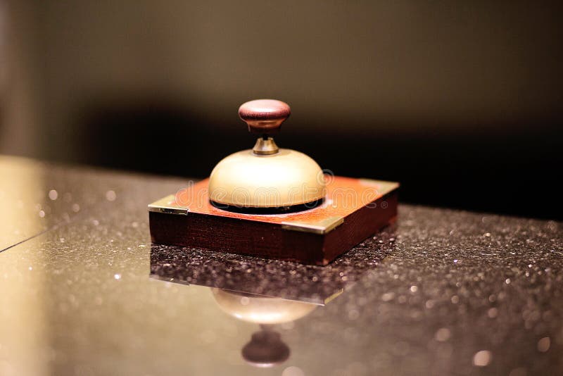 Service bell on the table stock photo. Image of reflection - 85006790