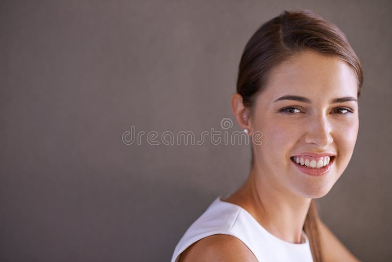 Service with a Broad Smile. a Beautiful Young Woman Standing in a ...