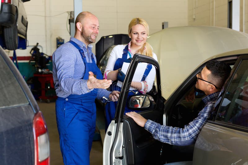 Service Crew and Driver Near Car Stock Photo - Image of european ...