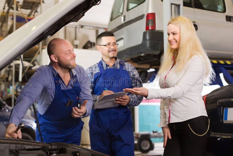 Service Crew and Happy Driver Stock Photo - Image of people, indoor ...