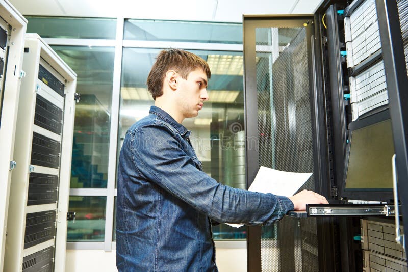 Young it Engeneer in Datacenter Server Room Stock Photo - Image of ...