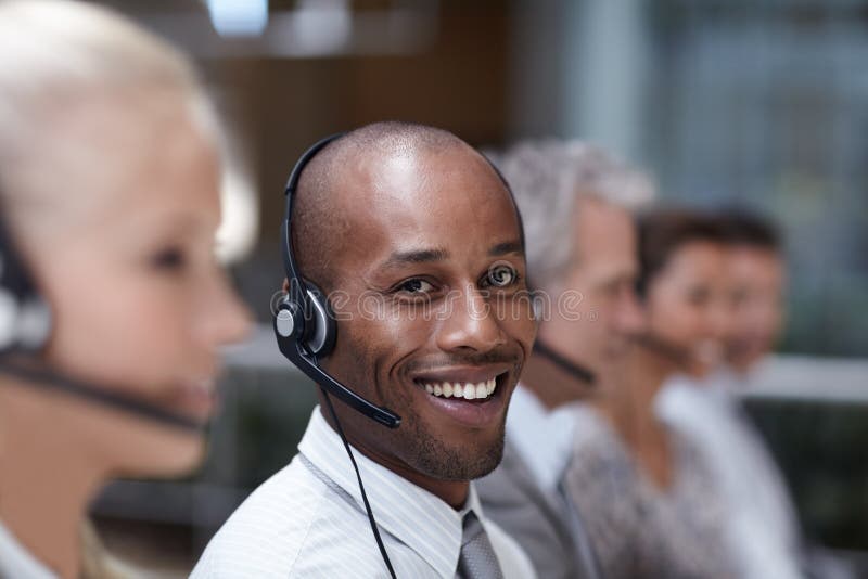Service with a Friendly Smile. Portrait of a Handsome African American ...