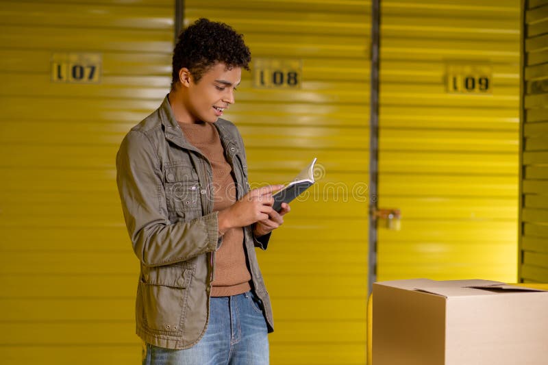 Service Man Checking the Boxes Aand Looking Excited Stock Photo - Image ...