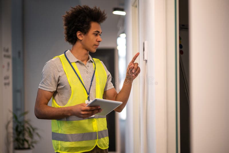 Service Man Checking the Sensor Door Locker and Looking Involved Stock ...