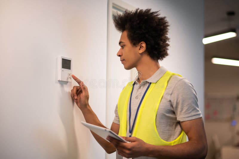Service Man Checking the Sensor Door Locker and Looking Involved Stock ...